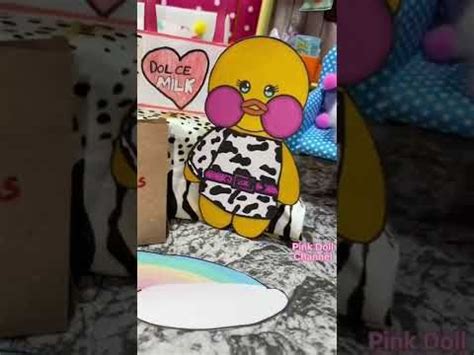 An Animated Image Of A Yellow Duck In A Pink Shirt And Some Other Items
