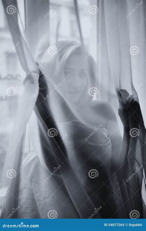 The Young Beautiful Girl Poses Behind A Curtain Stock Image Image Of Person Blonde 54077265