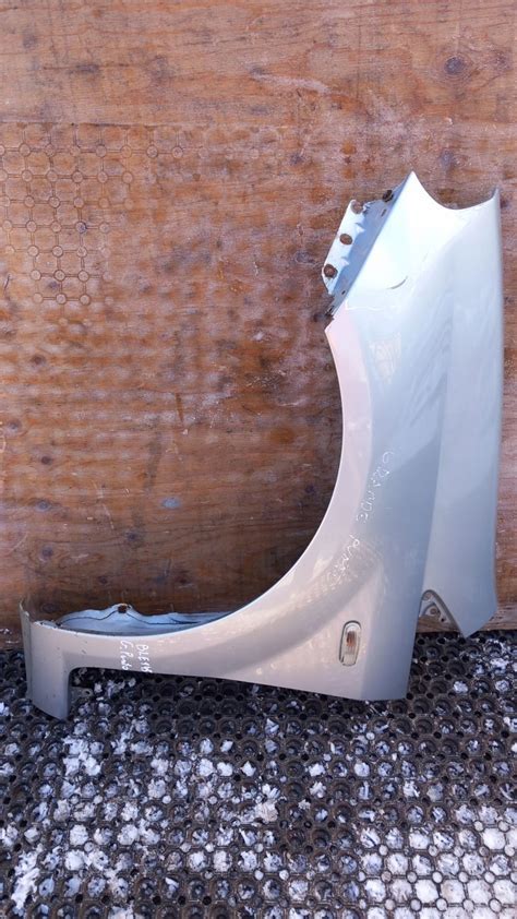 FIAT GRANDE PUNTO EVO BŁOTNIK PRZÓD LEWY 1 za 199 zł z POBIEDZISKA