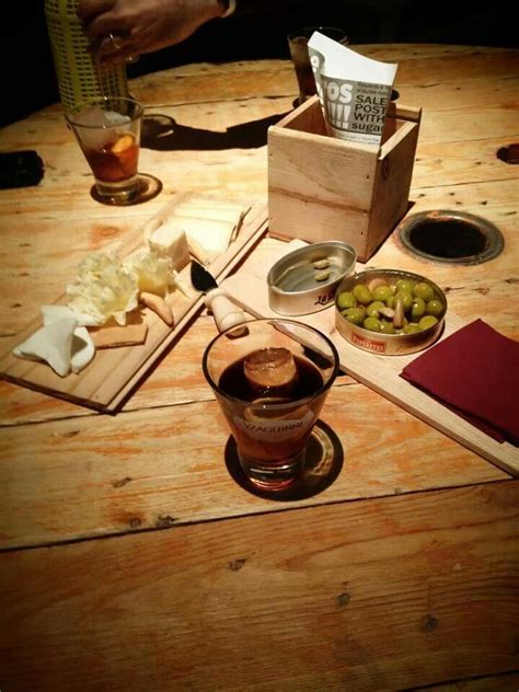 A Wooden Table Topped With Lots Of Food