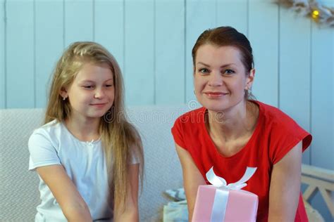 Happy Daughter Gives Her Mother A T Stock Image Image Of Happy Bonding 197083695
