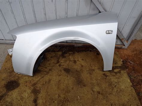 AUDI A4 B6 BLOTNIK LEWY PRZOD LY7W 15196554056 Oficjalne