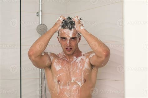 Man Taking Shower In Bath 31041480 Stock Photo At Vecteezy