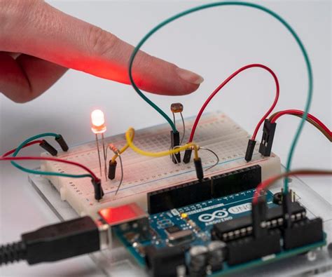 light sensor photoresistor with arduino in tinkercad arduino light sensor electronics projects