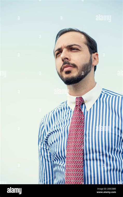 Man Wearing Shirt And Tie Looking Away Outdoors Stock Photo Alamy