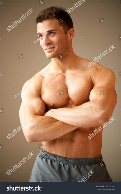 Smiling Handsome Man Muscular Arms Crossed Stock Photo 105078164