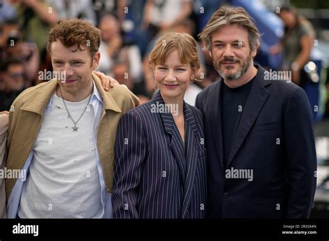 Antoine Reinartz Left Sandra Huller And Samuel Theis Pose For