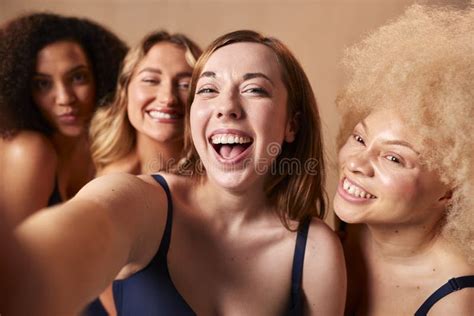 Group Of Diverse Body Positive Women Friends In Underwear Posing For