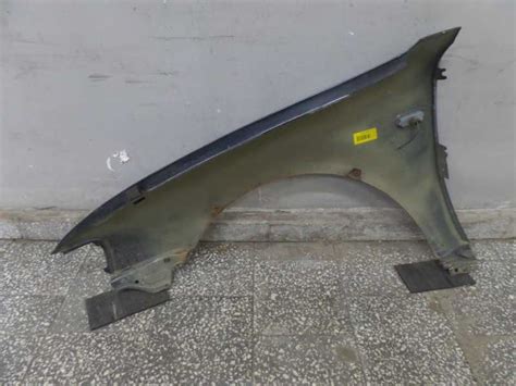VW PASSAT B5 BLOTNIK PRAWY PRZOD 96 00 LC7U JBT