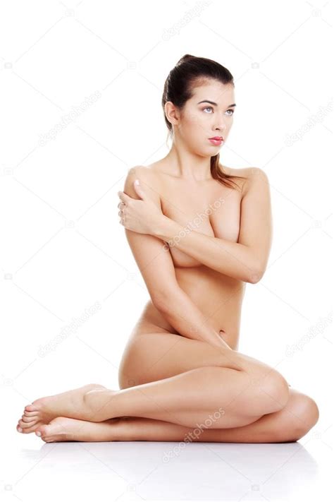 Mujer desnuda en forma sexy con piel limpia y saludable fotografía de