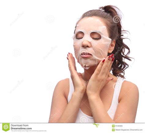 Brunette Woman Doing Facial Mask Sheet Beauty And Skin Care Concept Girl Applying Mask To Her
