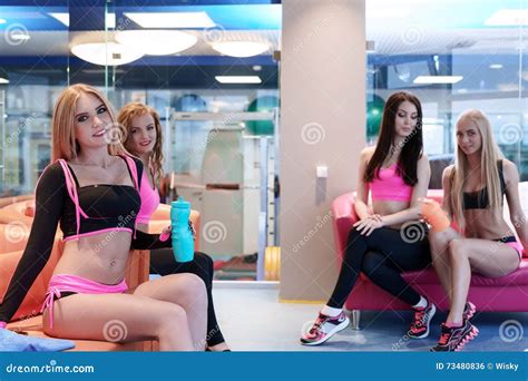 Beautiful Girls Resting Before Training In Gym Stock Photo Image Of