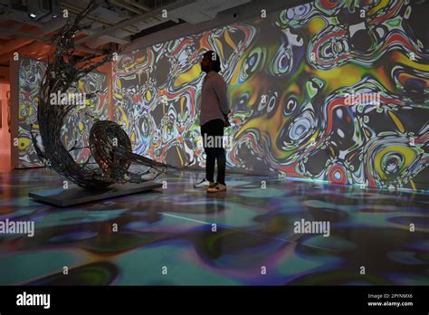 Digital Artist Osf Surrounded By Immersive Art By Agoria And Sculpture