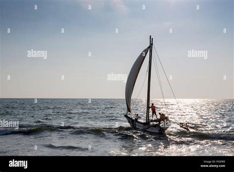View Of Traditional Outrigger Fishing Boat Oruva With Sail On Negombo