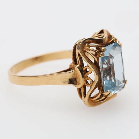 RING 18K Guld blå sten Smycken Ädelstenar Enstensringar Auctionet
