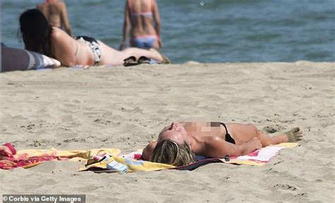 Fury As Topless Sunbathers Are Told To Cover Up Their Breasts By French