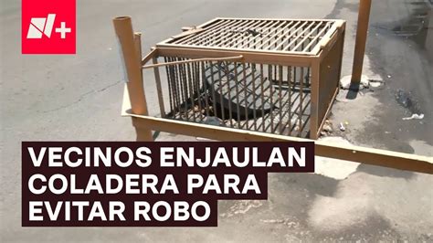 Vecinos Construyen Jaula Para Evitar Robo De Tapa De Coladera N