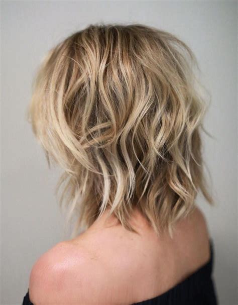 Related About Medium Length Shaggy Hairstyles With Bangs Page 1