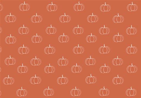 An Orange Background With White Pumpkins On It