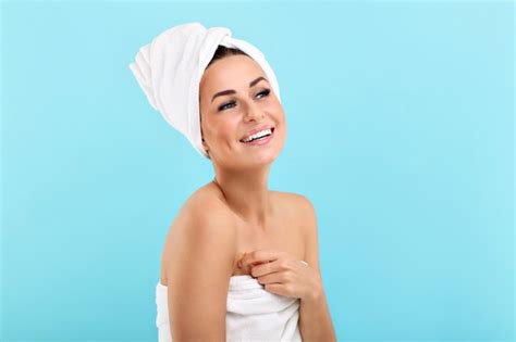 Premium Photo Spa Skin Care Beauty Woman With Towel Over Blue Background