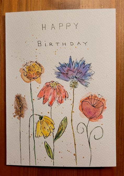 A Happy Birthday Card With Watercolor Flowers