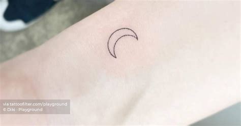 Minimalist Crescent Moon Tattoo On The Wrist