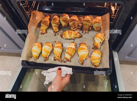 Freshly Baked Croissants In The Baking Oven Stock Photo Alamy