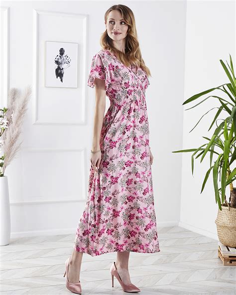 Royalfashion Różowa damska długa sukienka w kwiaty Różowy