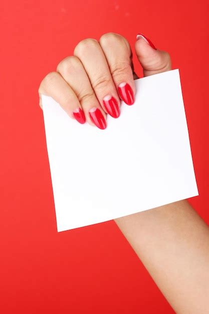 Premium Photo Woman S Hand Holding Blank Card On Color Background