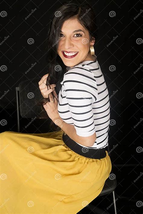 Pretty Woman Sitting Down Playing With Her Dark Hair Stock Image Image Of Dark Beauty 54558537