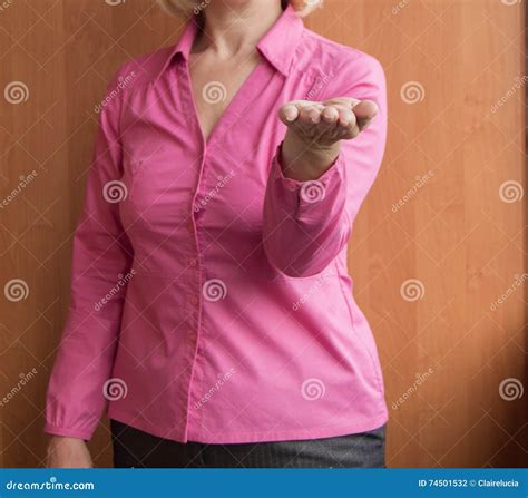 Female Holding An Open Palm Hand Up Presenting And Showing Something