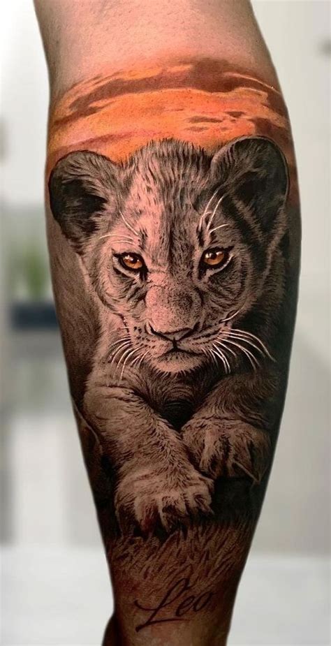 Eye Catching Lion Tattoos Lioness And Cub Tattoo Lion Cub Tattoo Leo