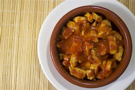 Cocina Mesa Y Mantel Magro De Cerdo Con Tomate