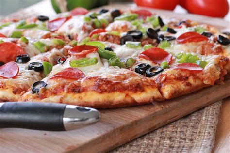 Receita de pizza caseira para começar a semana Que delícia