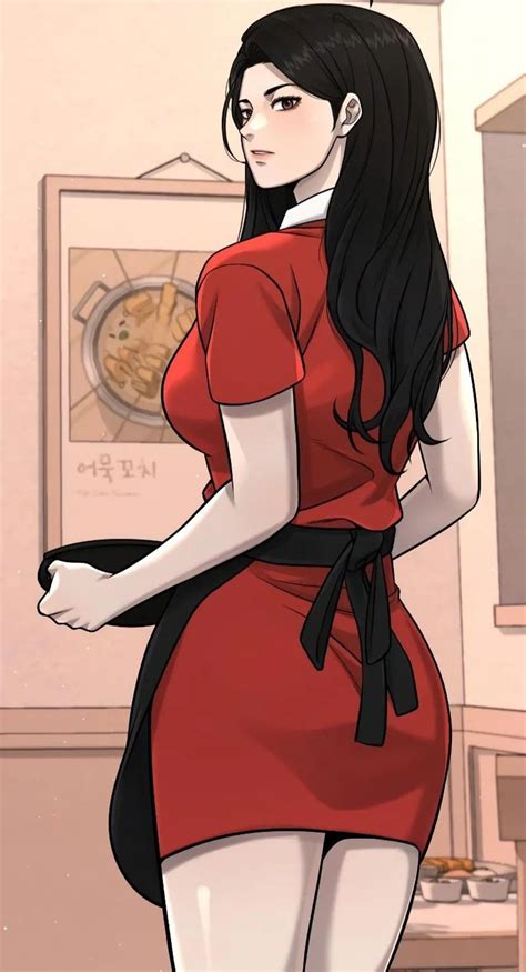 A Woman In A Red Dress With Long Black Hair