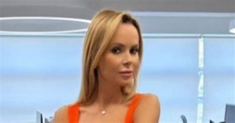 Amanda Holden Removes Her Bra And Wears A Low Cut Orange Top In A