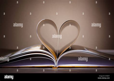 Pages Of Book Curved Into A Heart Shape Stock Photo Alamy
