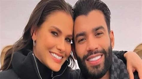 Andressa Suita mostra filhos Gusttavo no lago da mansão