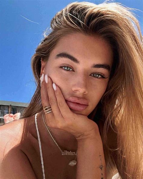 Love Island S Arabella Chi Looks Nearly Naked As She Oils Up In Barely