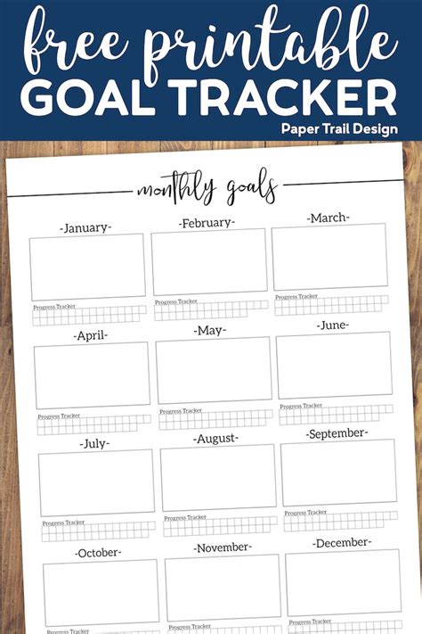 The Free Printable Goal Tracker Is Shown On A Wooden Table With Text