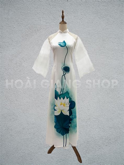 Áo dài múa màu trắng hoa sen xanh Hoài Giang shop