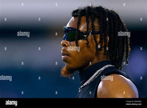 Minnesota Vikings Wide Receiver Justin Jefferson 18 Looks On During