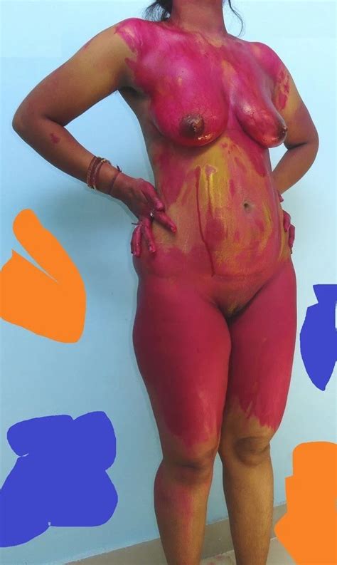 Desi Milf Exposing Her Slim Curves Covered In Holi Colors And Showing