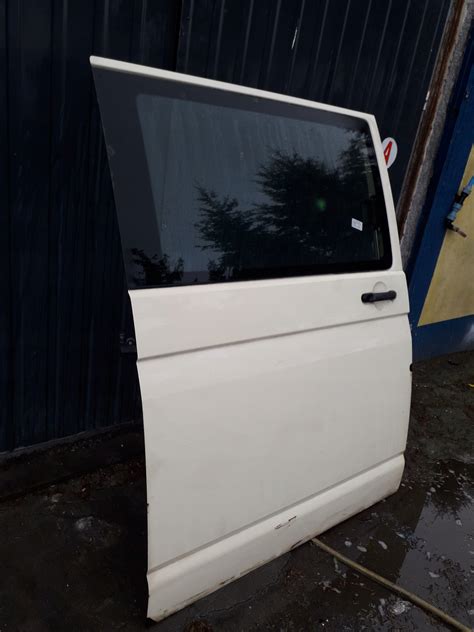 VW TRANSPORTER T5 T6 DRZWI PRAWE BOCZNE PRZESUWNE Z SZYBĄ za 700 zł z