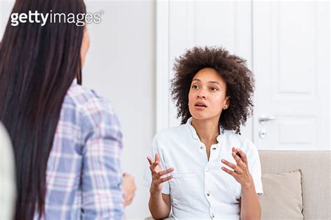 Psychologist Listening To Her Patient And Writing Notes Mental Health