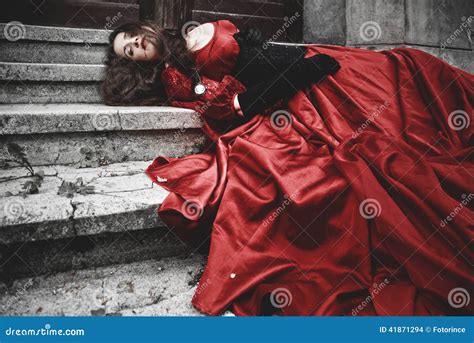 Lying And Bleeding Woman In Victorian Dress Stock Photo Image 41871294