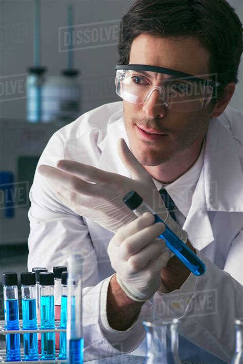 Scientist Conducting Experiment In Lab Stock Photo Dissolve