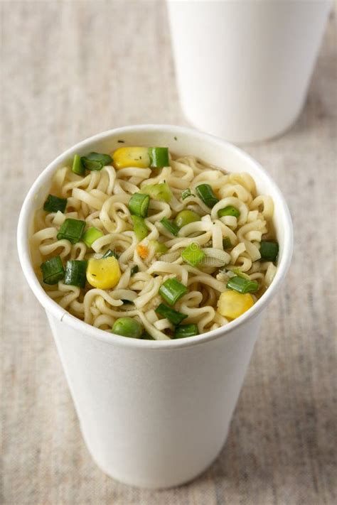 Instant Noodles With Beef Flavoring In A Paper Cup Low Angle View