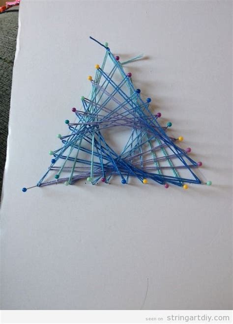 string art on a paper using pins and threads string art diystring art diy
