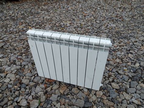Kaloryfer grzejnik domowy naścienny aluminiowy włoskiej marki 7 żeberek